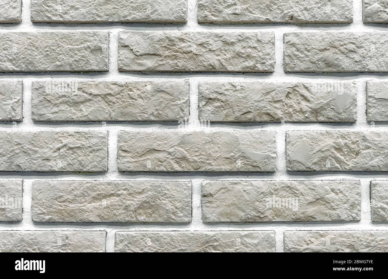 Brick wall of beige bricks. Background and texture of brickwork Stock ...