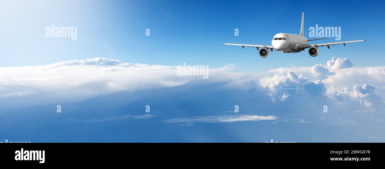 Panorama of a Airplane in the blue sky and cloud Stock Photo - Alamy