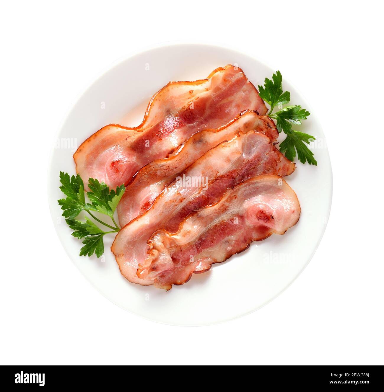 Fried bacon slices on plate isolated on white background Stock Photo ...