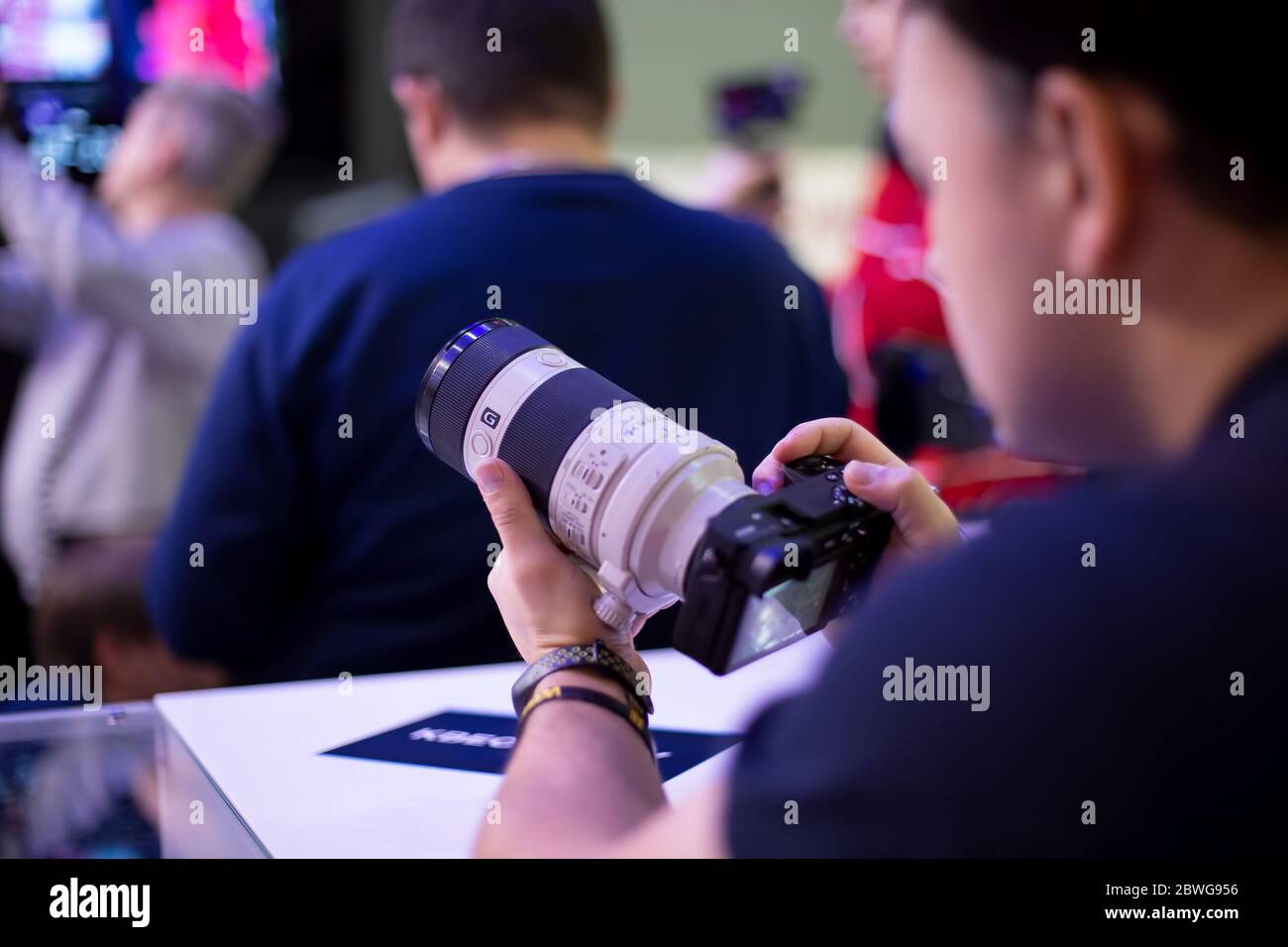 Moscow, Russia - October 04, 2019: men holds new camera sony alpha a7 ...