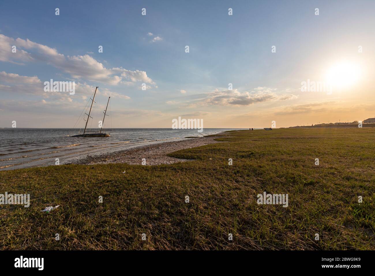 Yacht stranded in Ribble estuary inshore Lytham, Lancs, England, UK ...