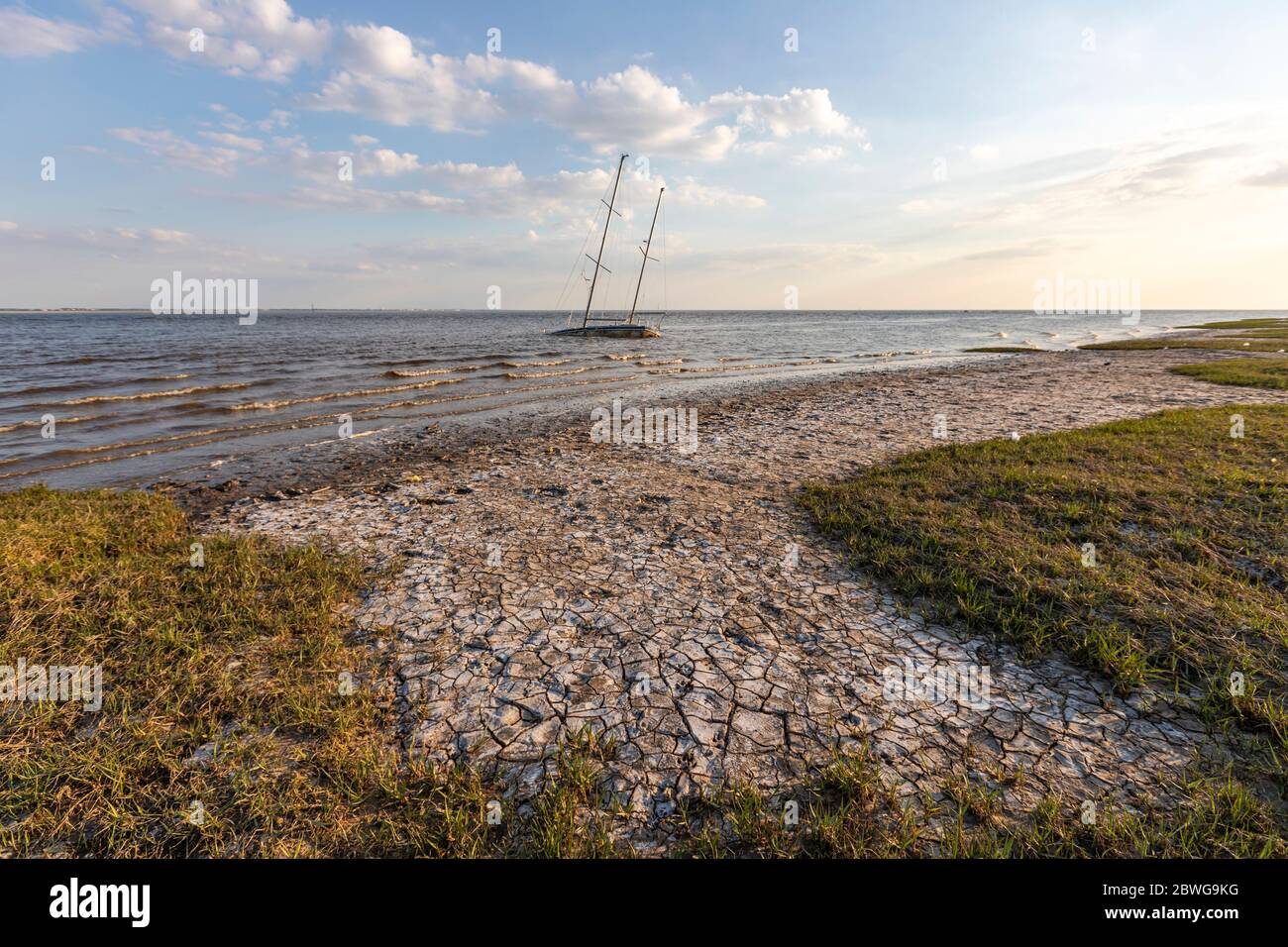 Yacht stranded in Ribble estuary inshore Lytham, Lancs, England, UK ...