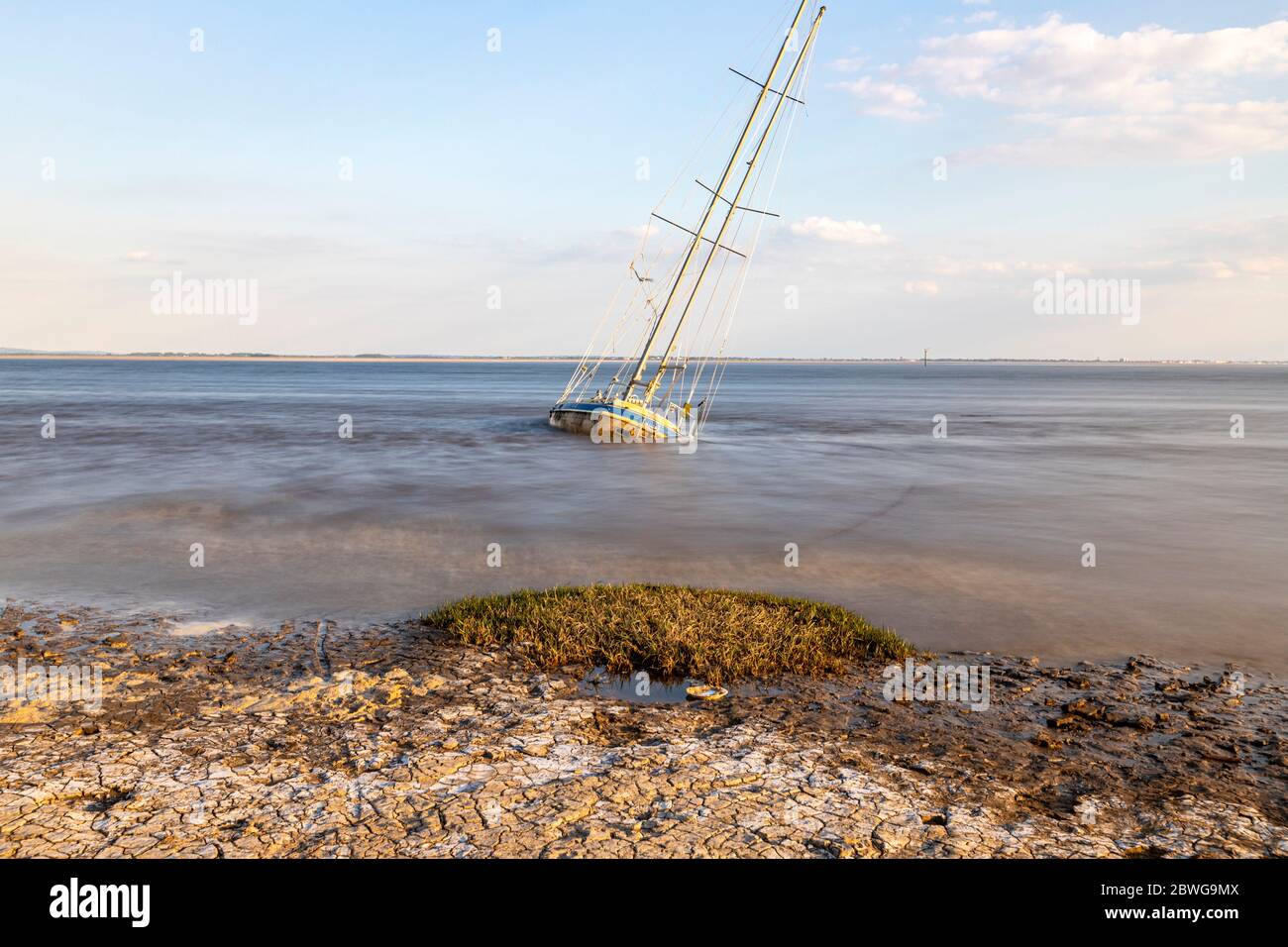 Yacht stranded in Ribble estuary inshore Lytham, Lancs, England, UK ...