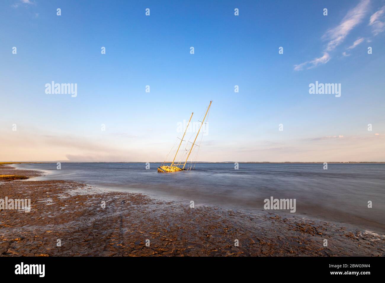 Yacht stranded in Ribble estuary inshore Lytham, Lancs, England, UK ...