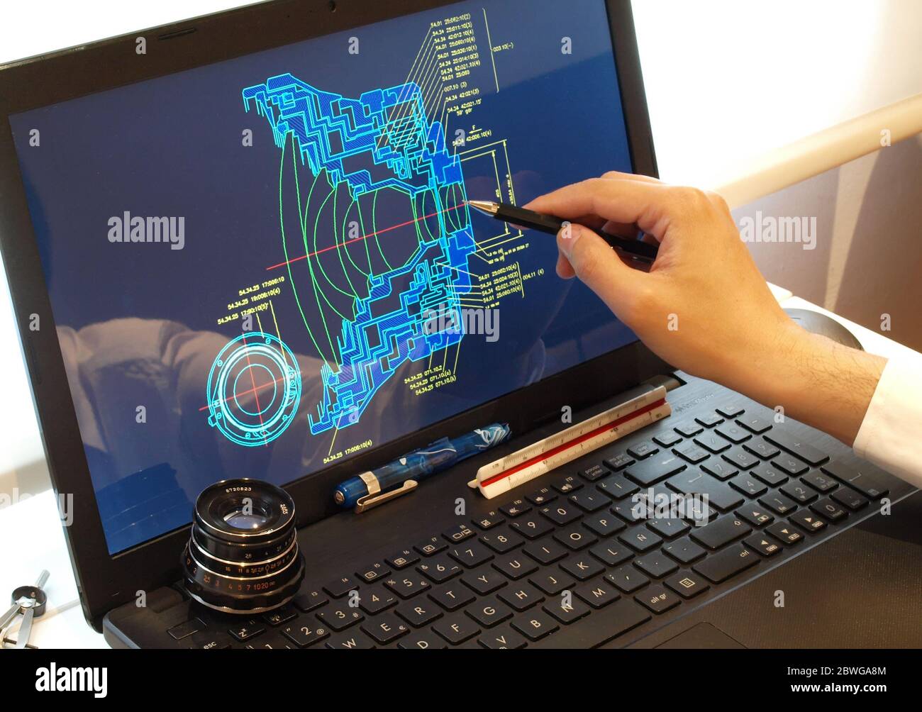 engineer working on computer at optical prototype scheme design Stock ...