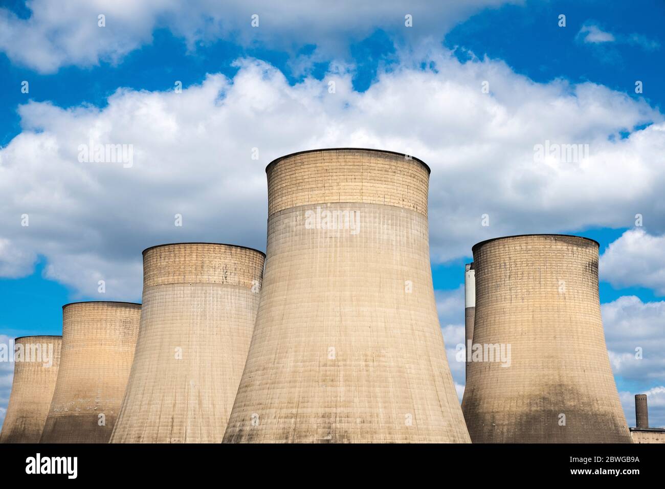 Concrete power station cooling towers background Stock Photo - Alamy