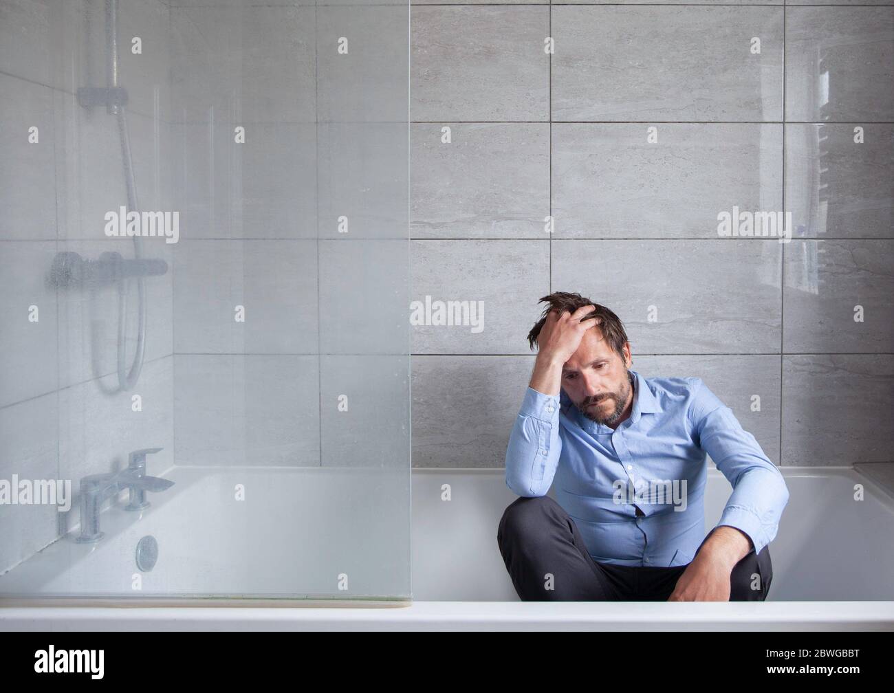 Man suffering with depression Stock Photo - Alamy