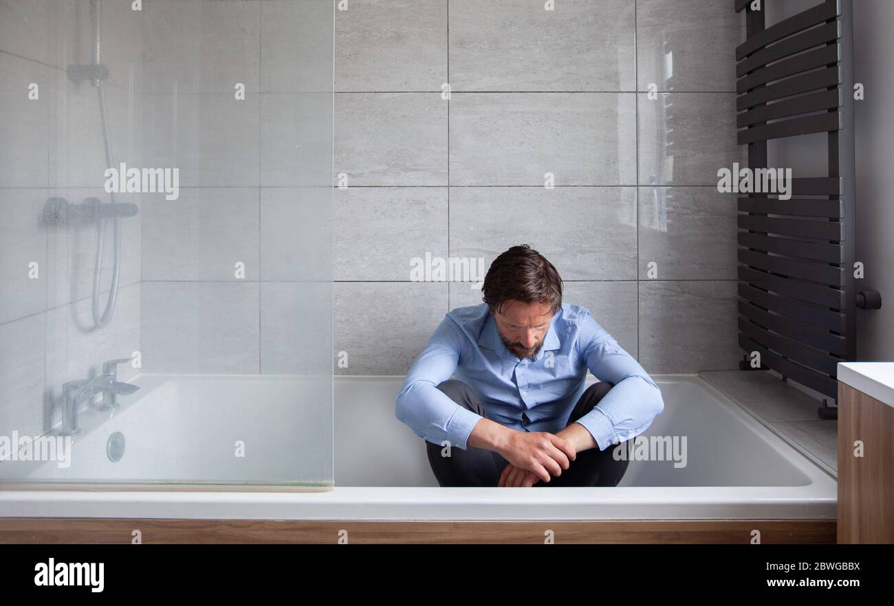 Man suffering with depression Stock Photo - Alamy