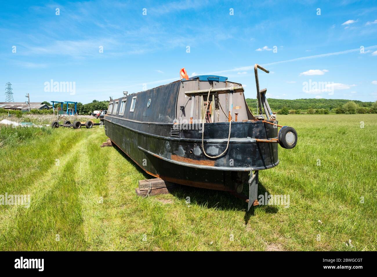 Old narrow boat in a field Stock Photo - Alamy