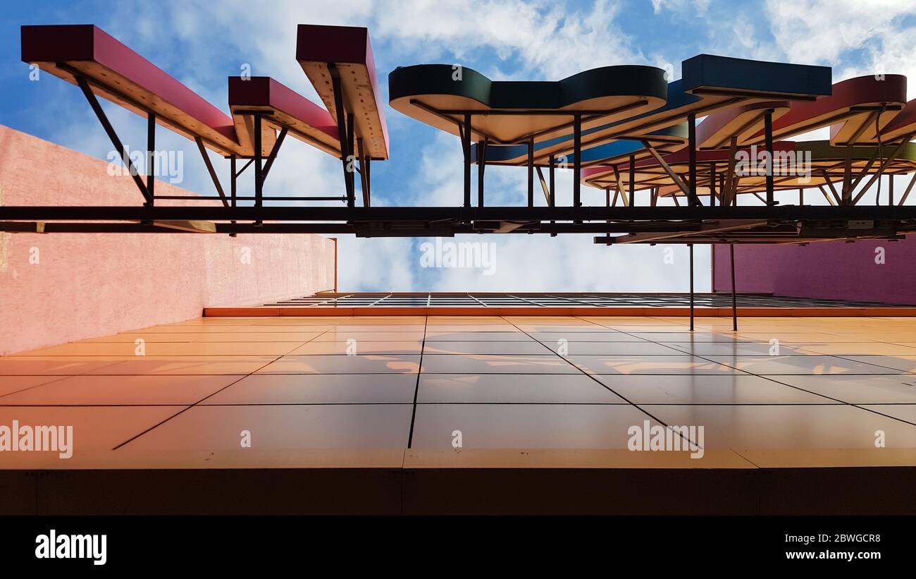 letters on the building. Bottom view of a store sign. Modern ...