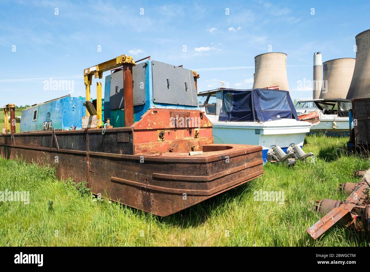 Old steel river work barge in a scrap yard Stock Photo - Alamy