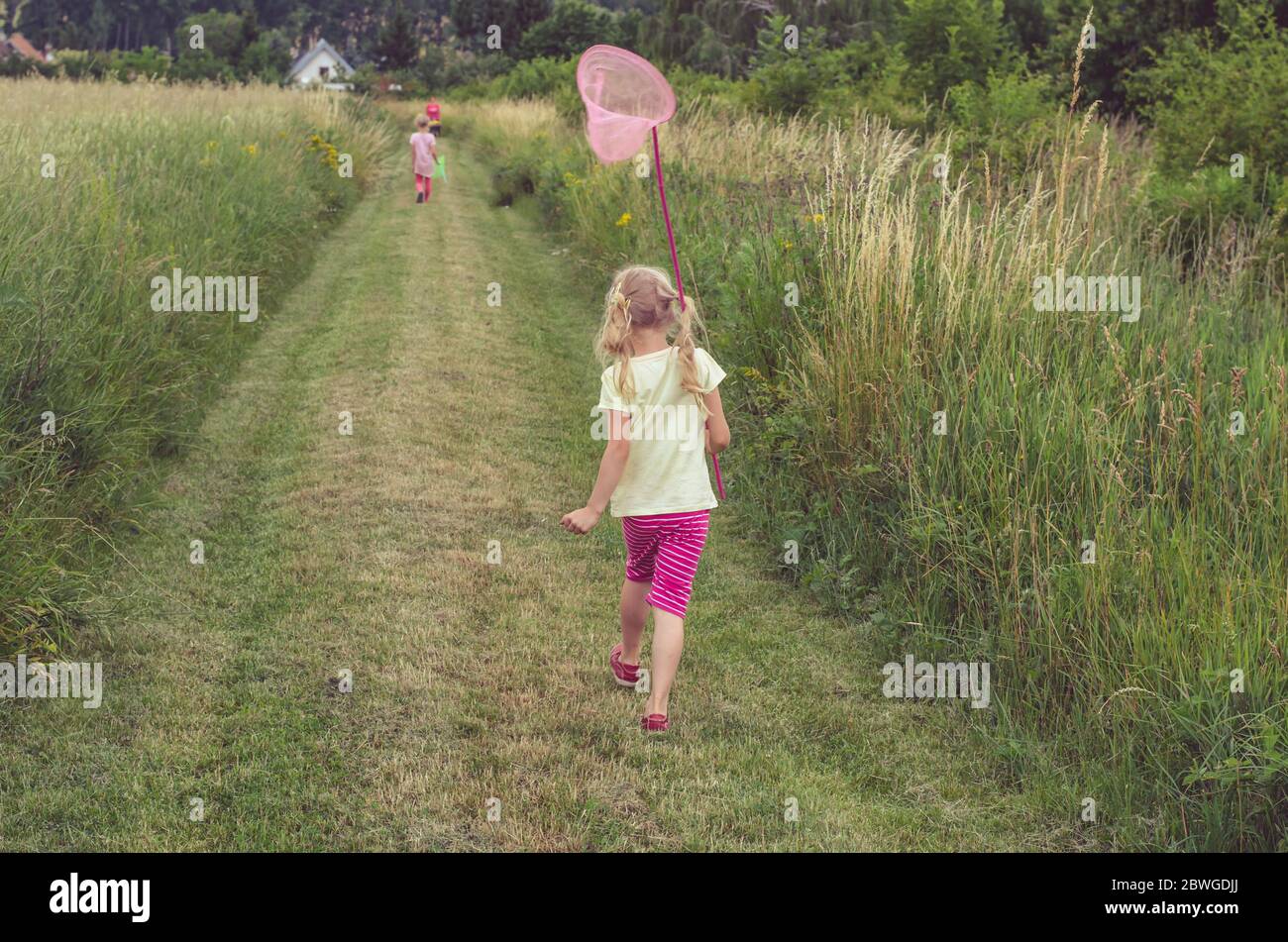 Child catching hi-res stock photography and images - Alamy