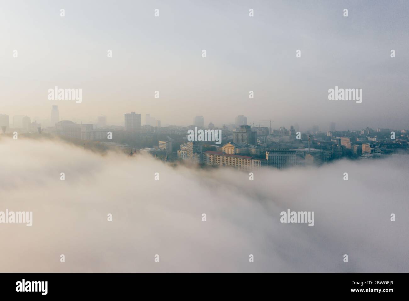 Aerial view of the city in the fog Stock Photo - Alamy