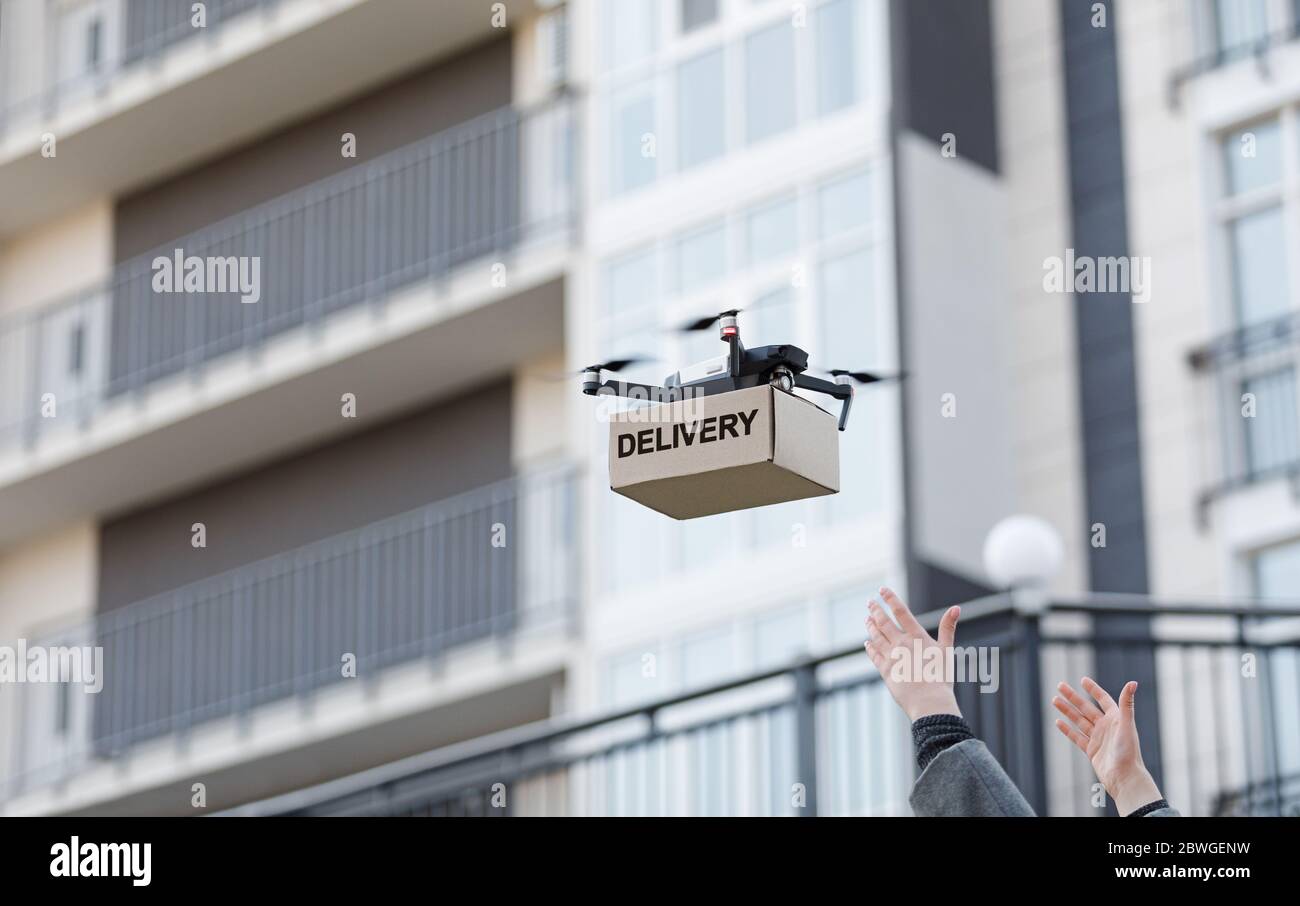 Flying drone carrying hi-res stock photography and images - Alamy