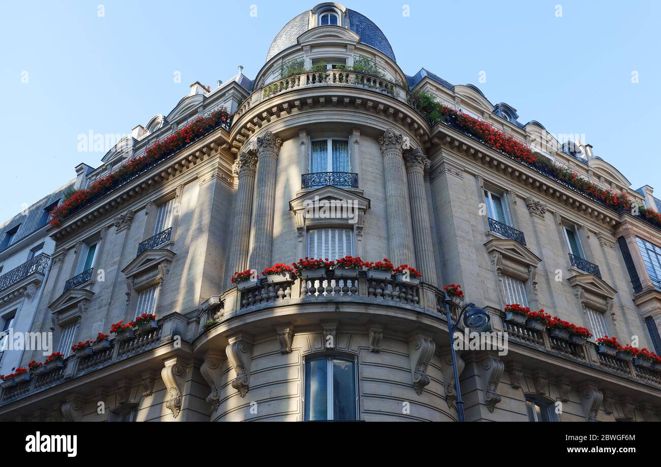 Traditional French house with typical balconies and windows. Paris ...