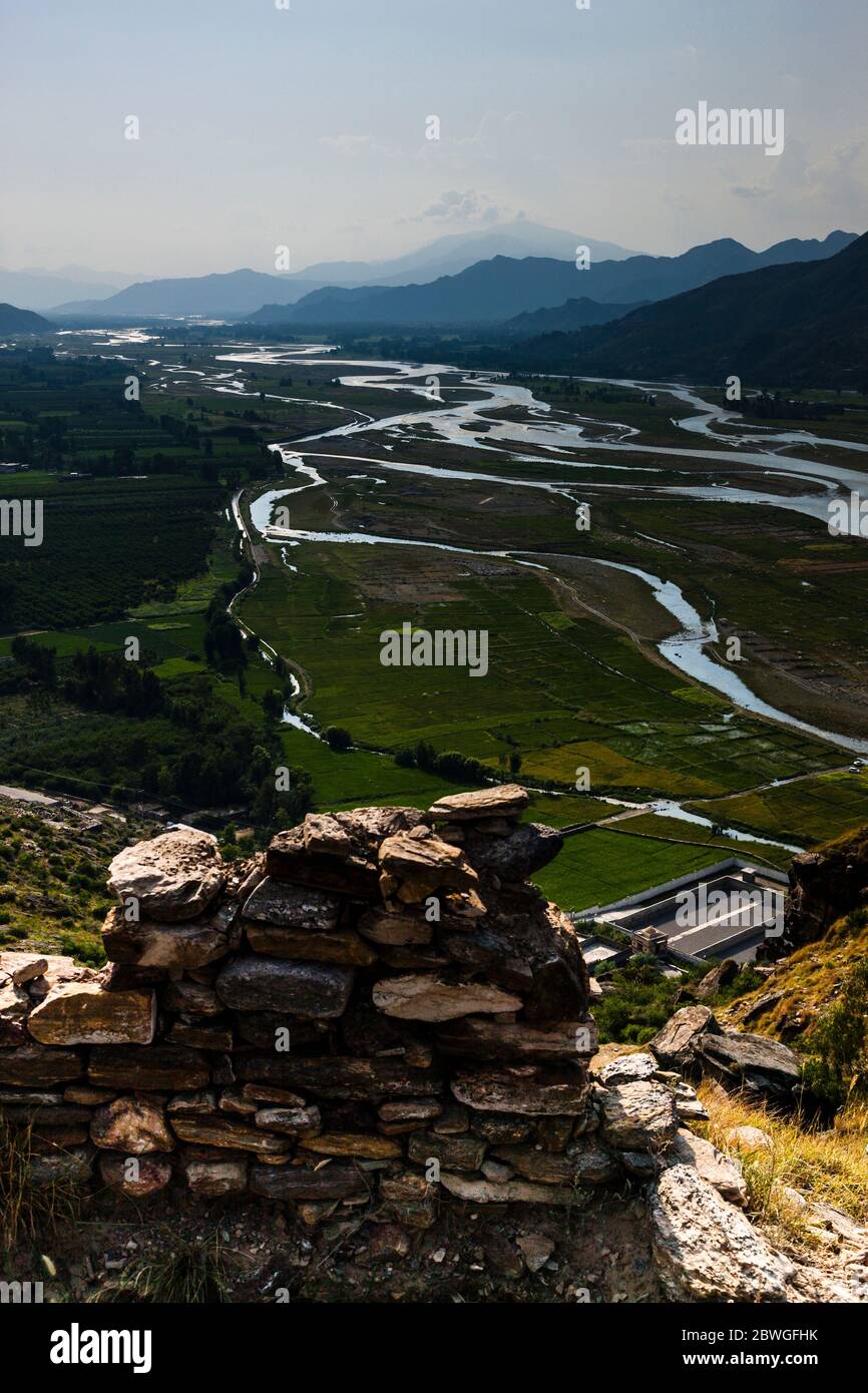 Swat river view from hilltop of ancient Bazira, Bazira ruins, Barikot ...