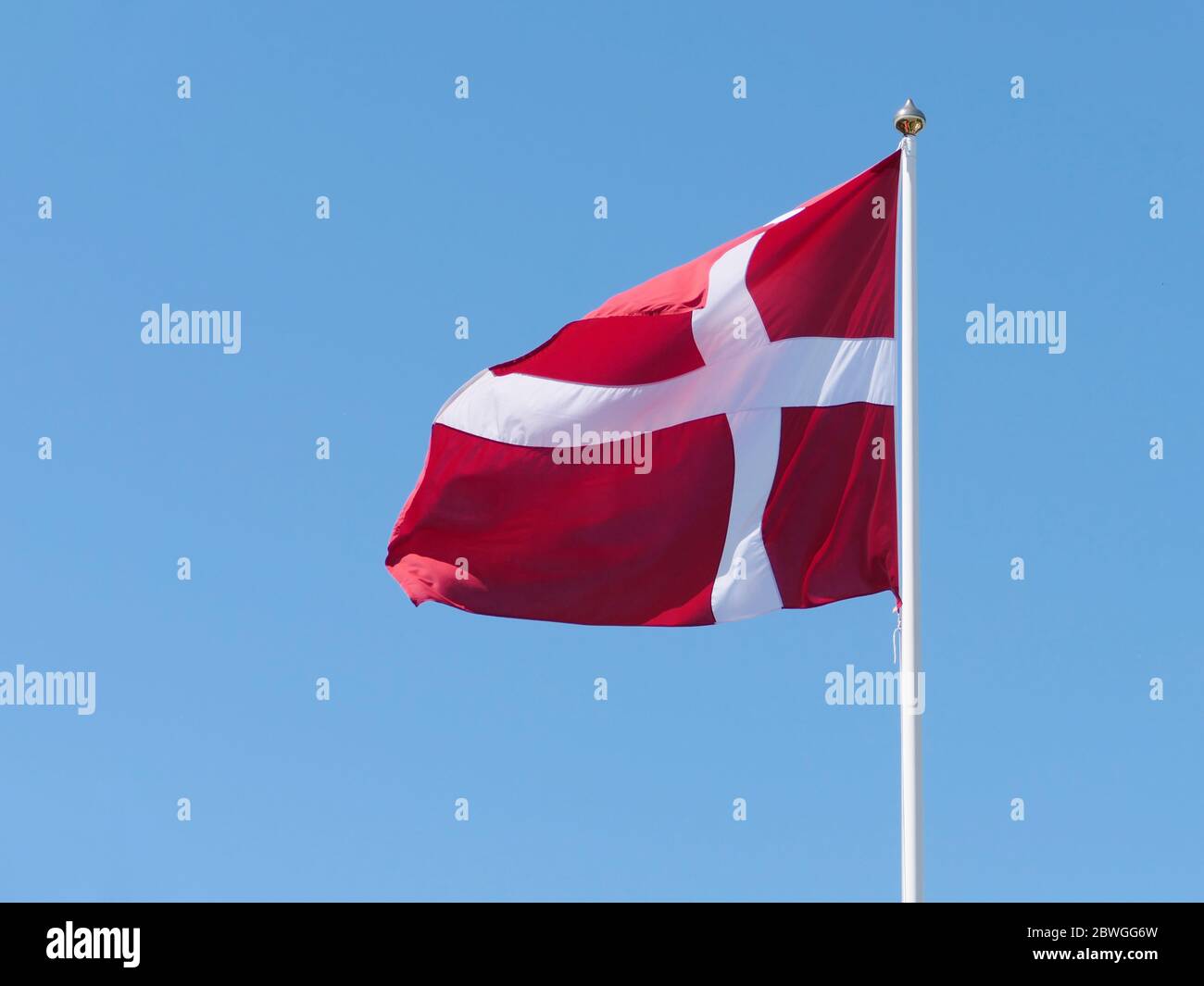 Danish flag blowing in wind hi-res stock photography and images - Alamy