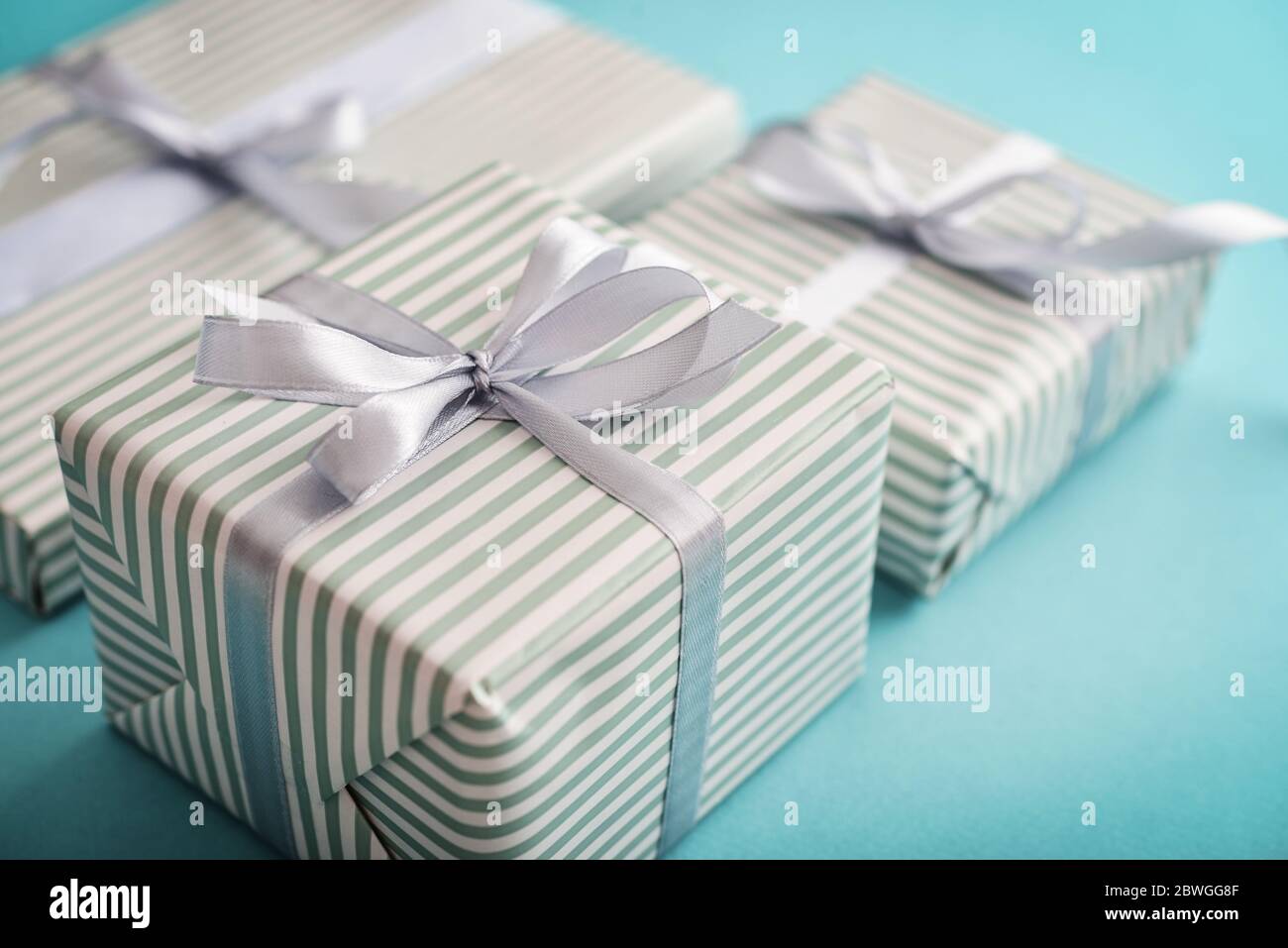 Grey gift boxes on white background hi-res stock photography and images ...