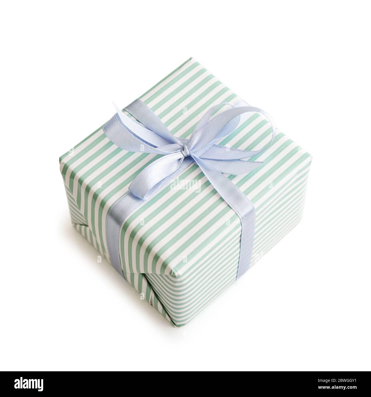 Striped gift box with blue ribbon isolated on white background with ...