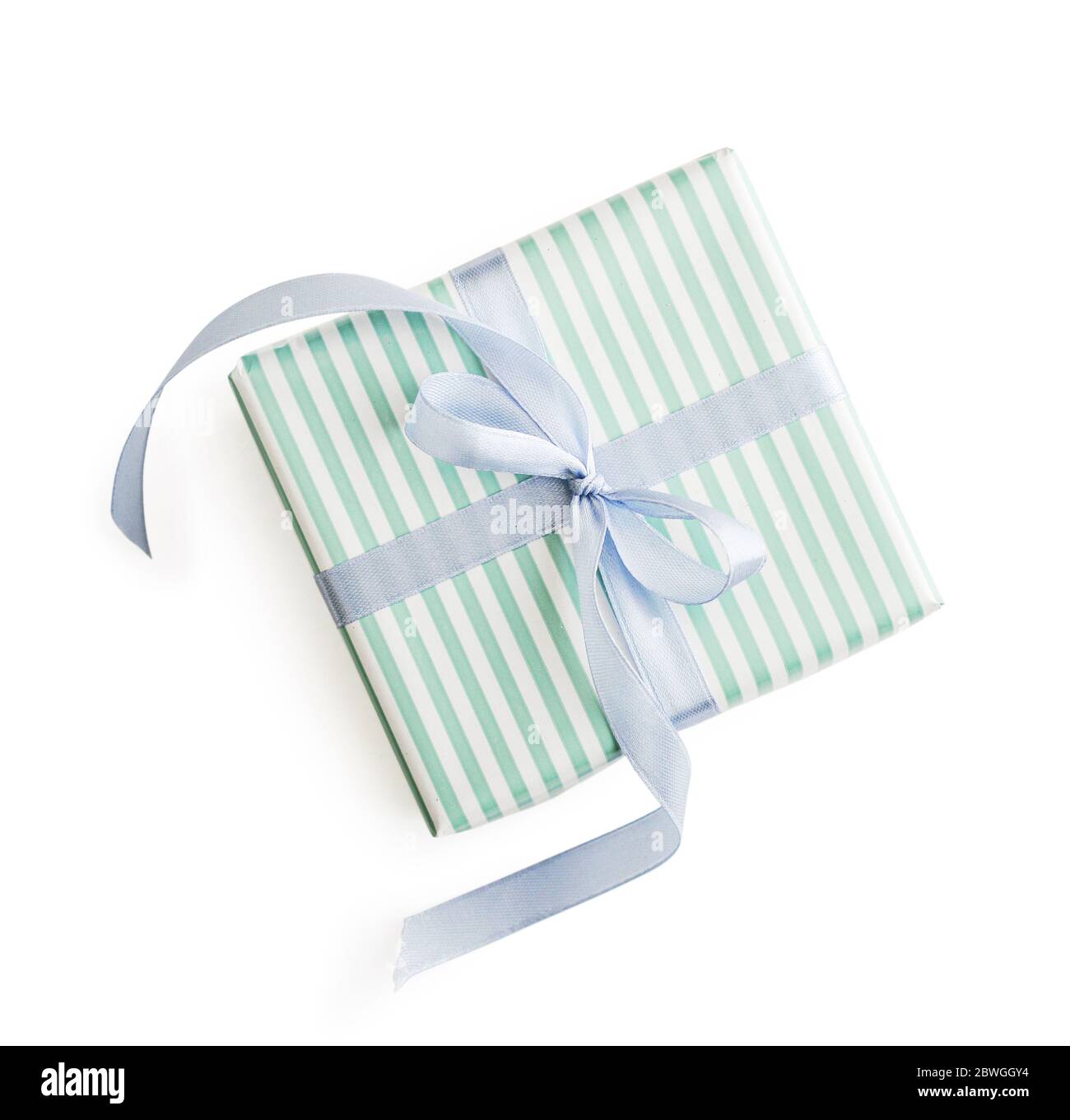 Striped gift box with blue ribbon isolated on white background with ...
