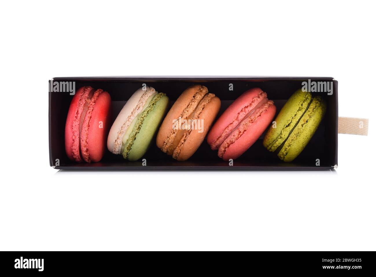 Macaroons on colored background Cut Out Stock Images & Pictures - Alamy