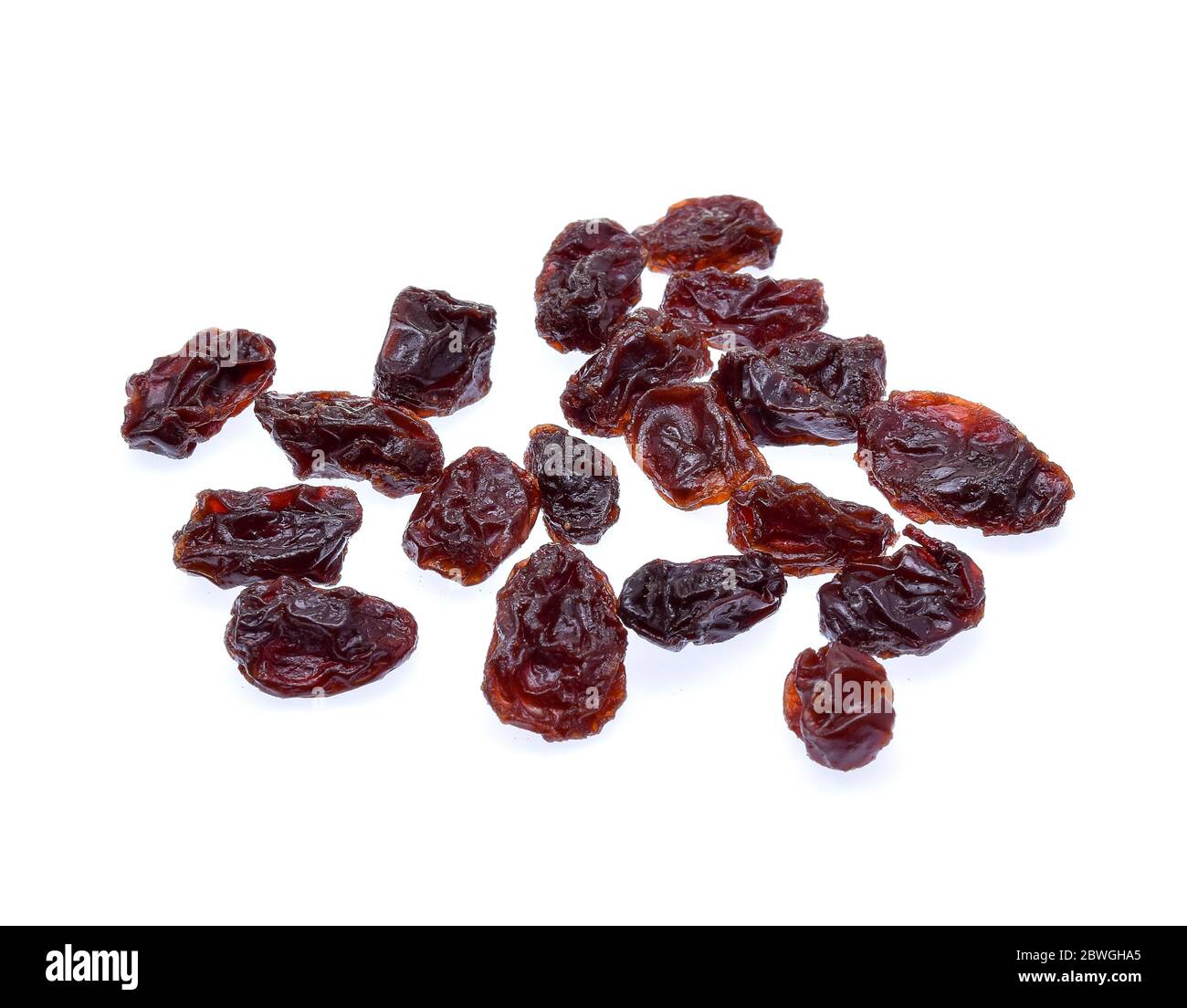 Dried raisins isolated on white background Stock Photo - Alamy