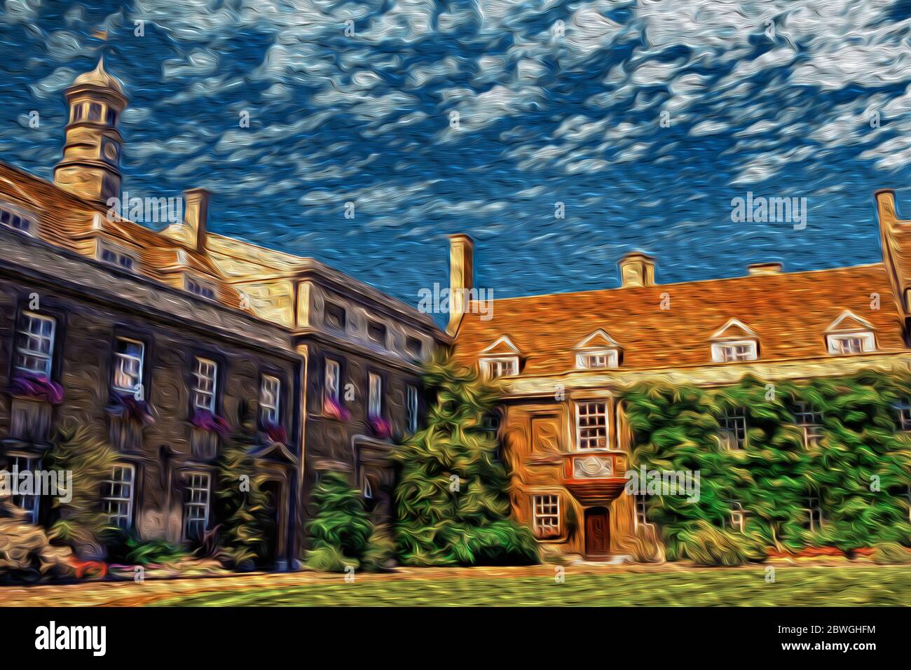 Gothic facade of old building in front of grassy courtyard in a college ...