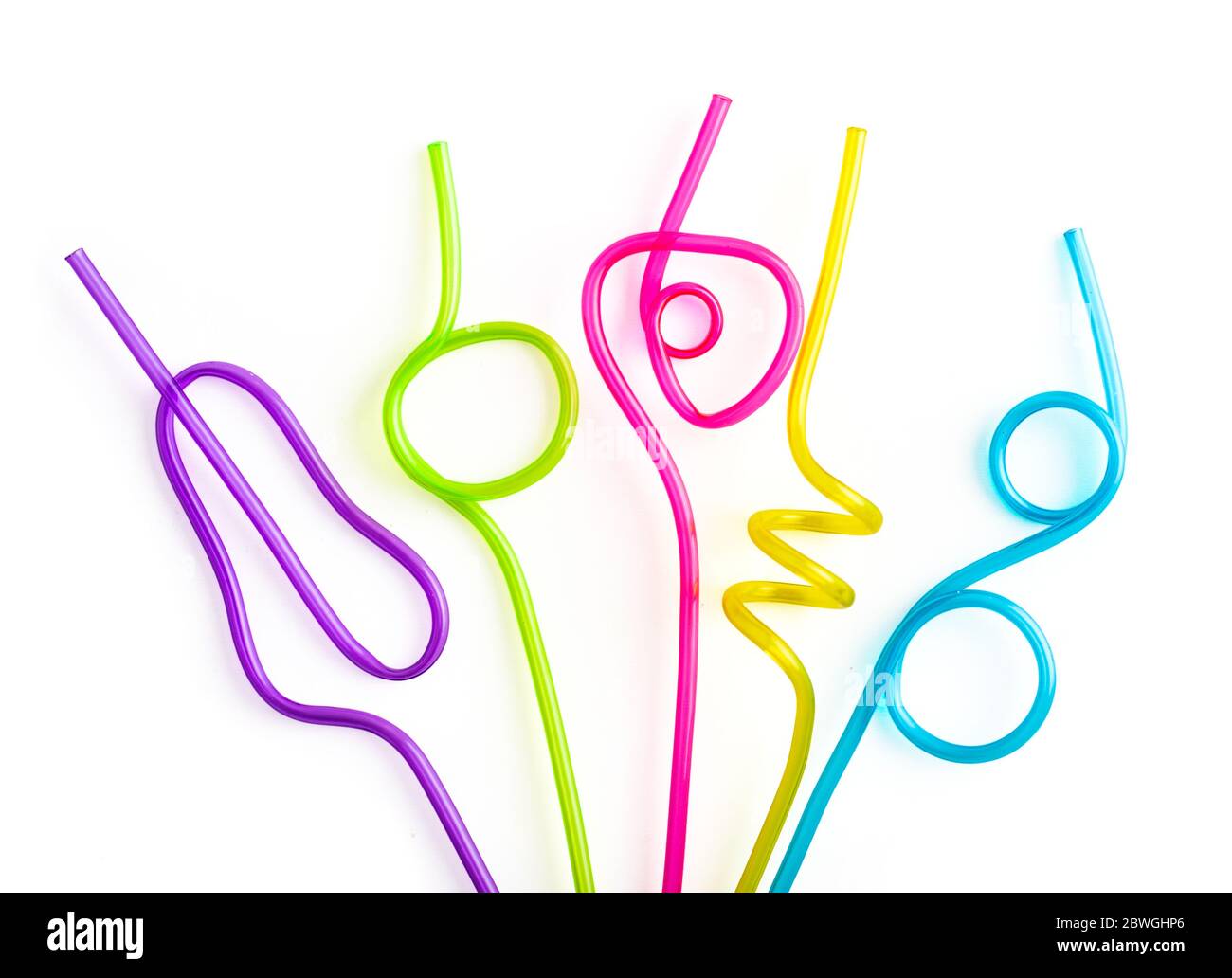 Multi-colored semi-transparent in many shapes straw. Drinking straws in ...