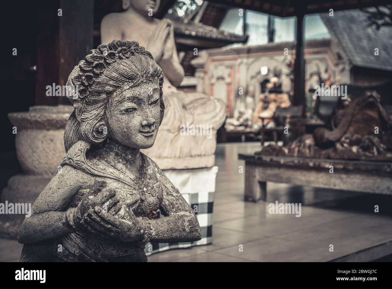 Traditional balinese stone sculpture of woman in Bali, Indonesia Stock ...