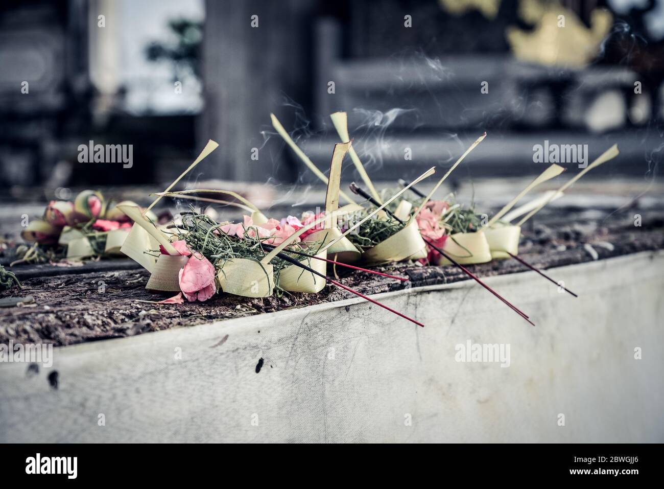 Traditional balinese offerings to gods in Bali with flowers and ...