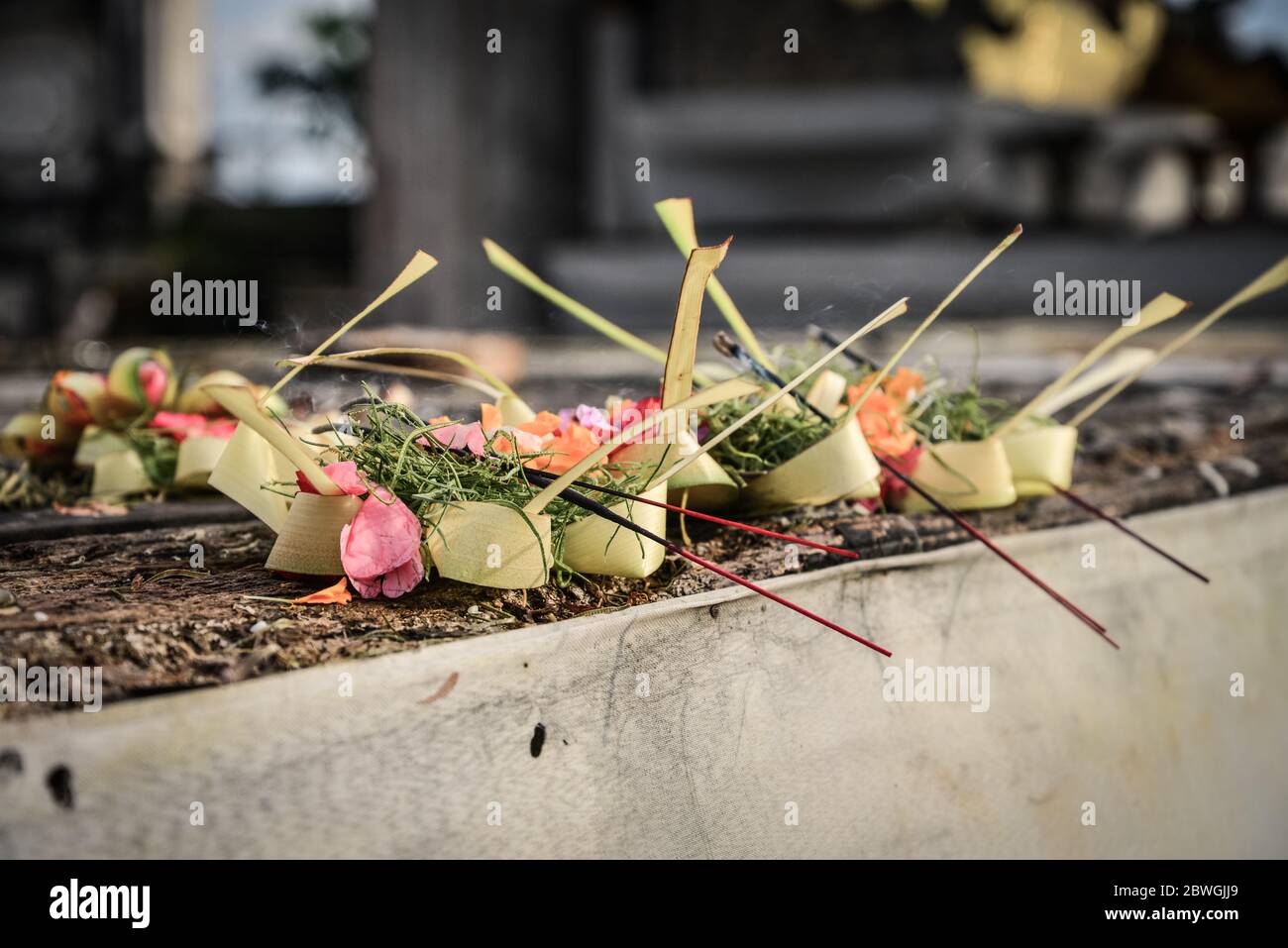 Traditional balinese offerings to gods in Bali with flowers and ...