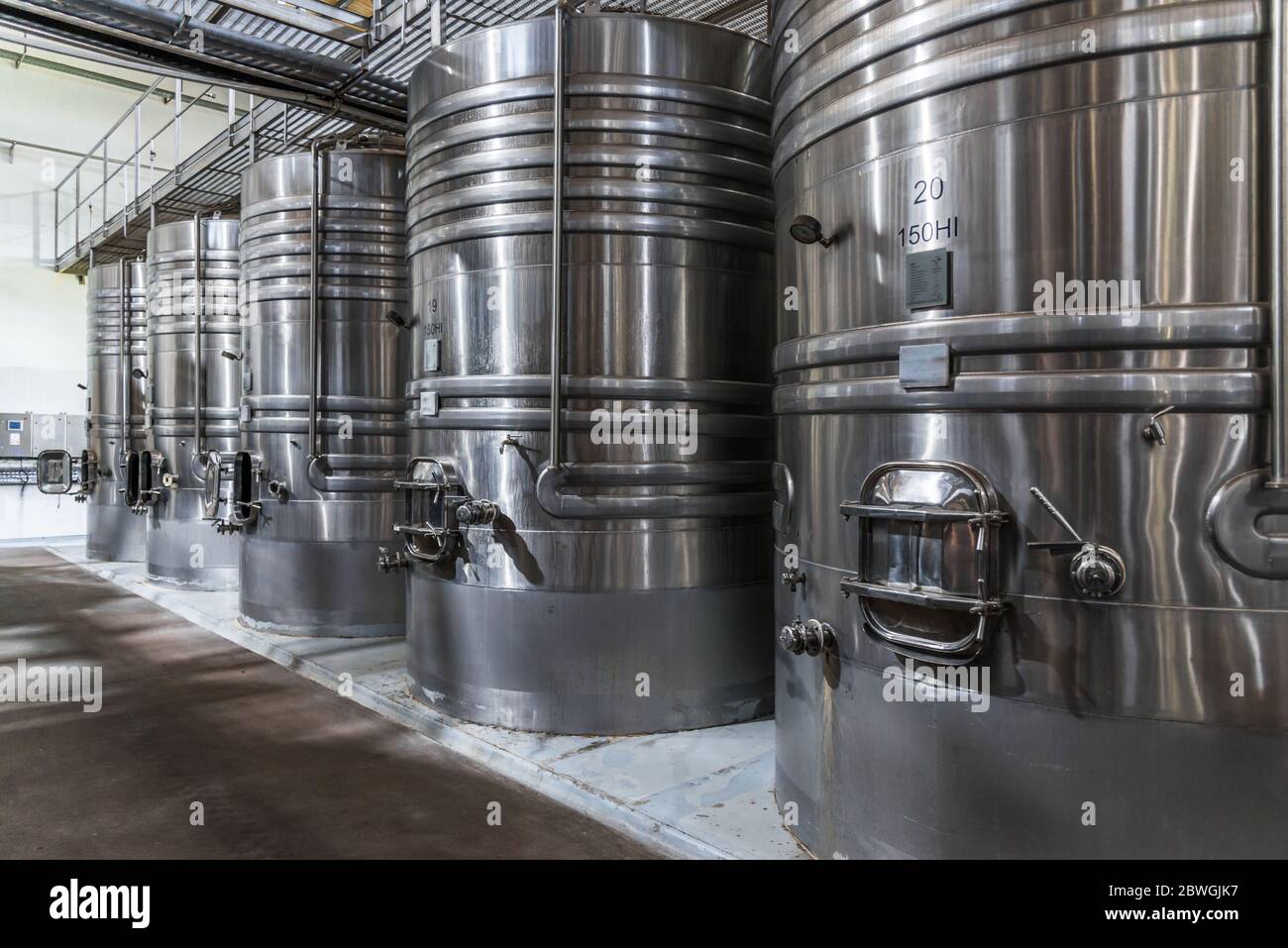 Steel wine tanks for wine fermentation at a winery Stock Photo - Alamy