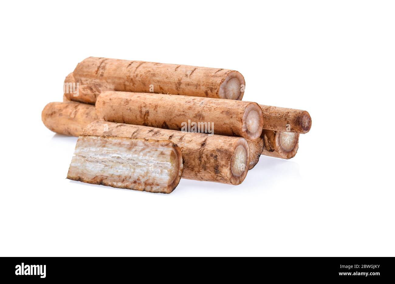 Burdock roots isolated white background Stock Photo - Alamy