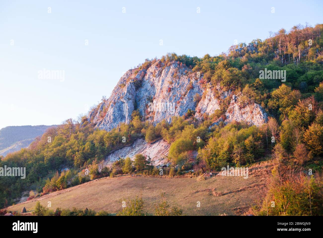 Nature landscape, beautiful view on rock peaks and forest at sunset ...