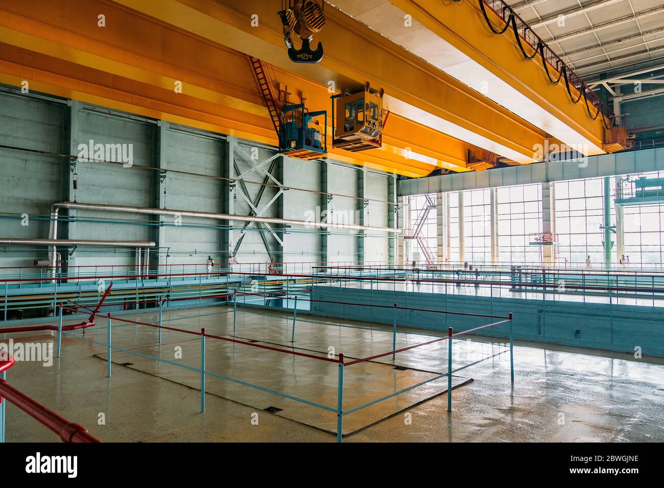 Industrial crane of bridge type inside factory or power plant Stock ...