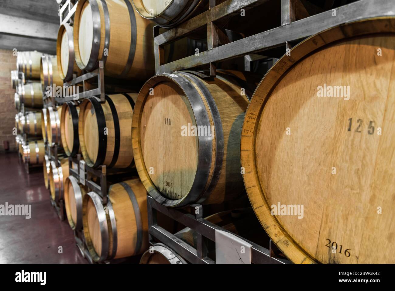 Oak wine barrels for wine fermentation at a winery Stock Photo - Alamy