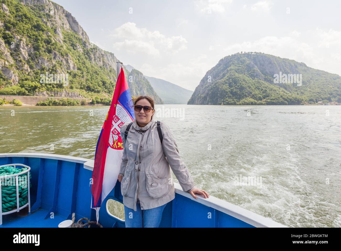 Portrait of smile tourist woman enjoy a cruise ship view of Danube ...