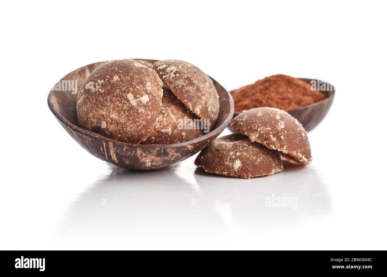 Coconut palm sugar jaggery in a bowl isolated on white background Stock ...