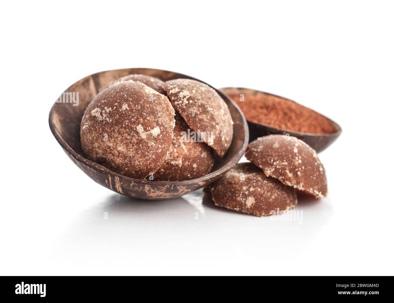 Coconut palm sugar jaggery in a bowl isolated on white background Stock ...