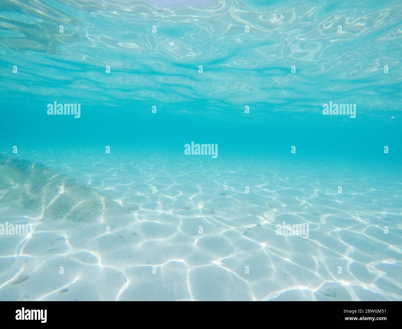 Underwater scene of tropical blue sea ripple water on white sand Stock ...