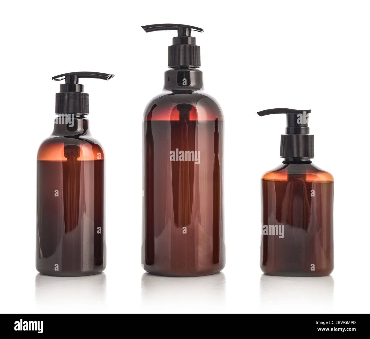Plastic brown bottles with dispenser pumps isolated on white background ...