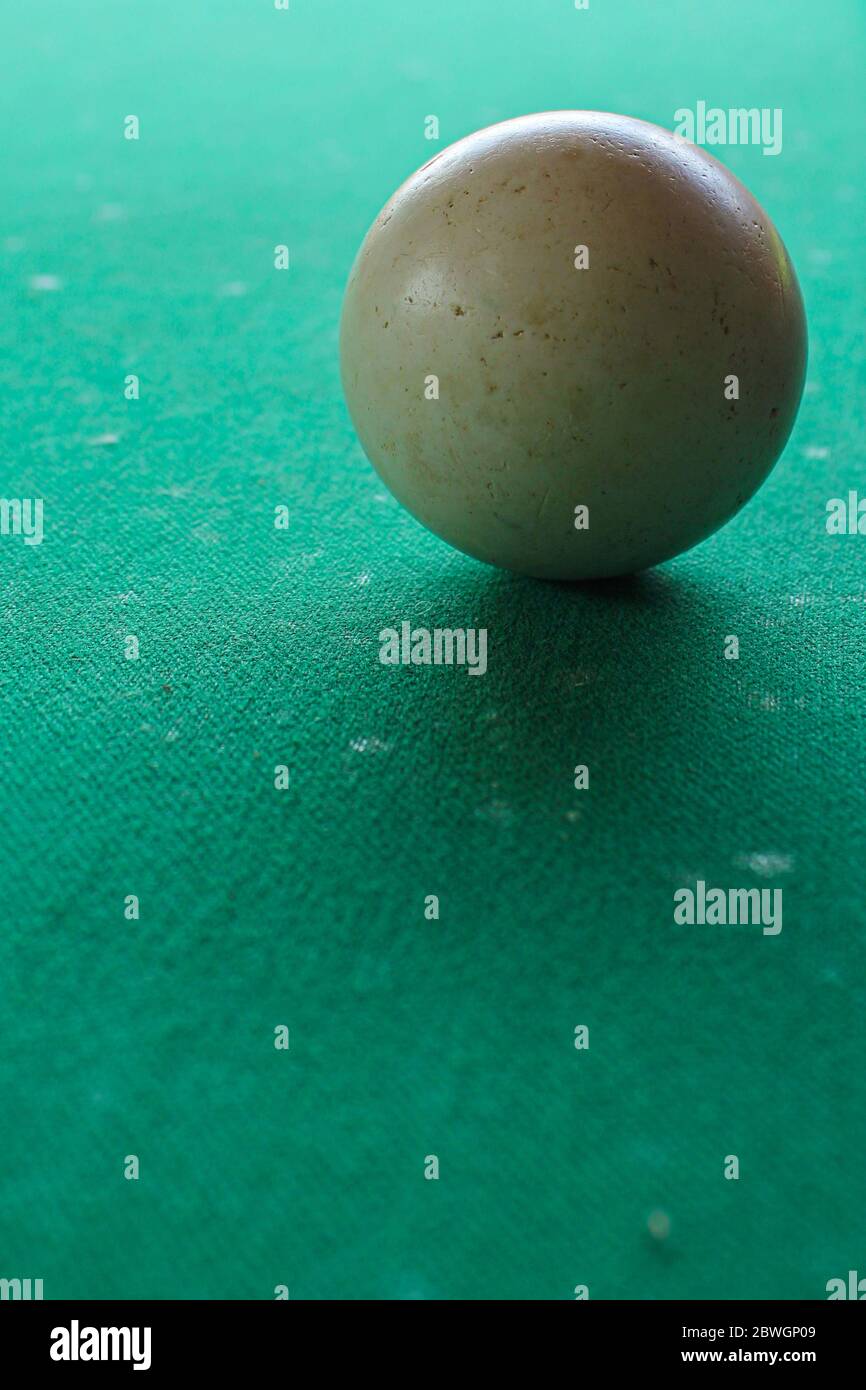 White ball on table hi-res stock photography and images - Alamy