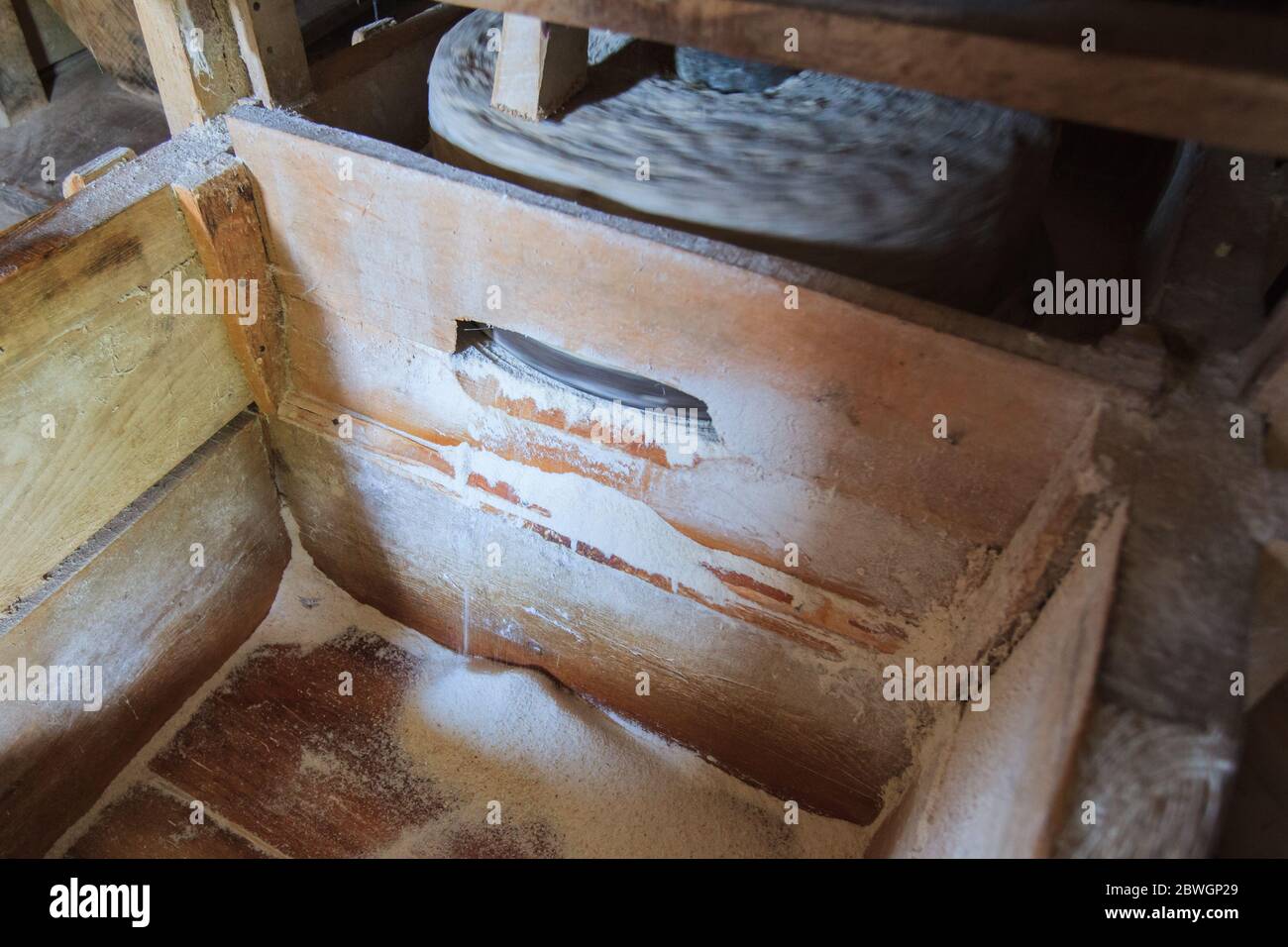 Traditional millstone for grinding grains at rustic mill Stock Photo ...