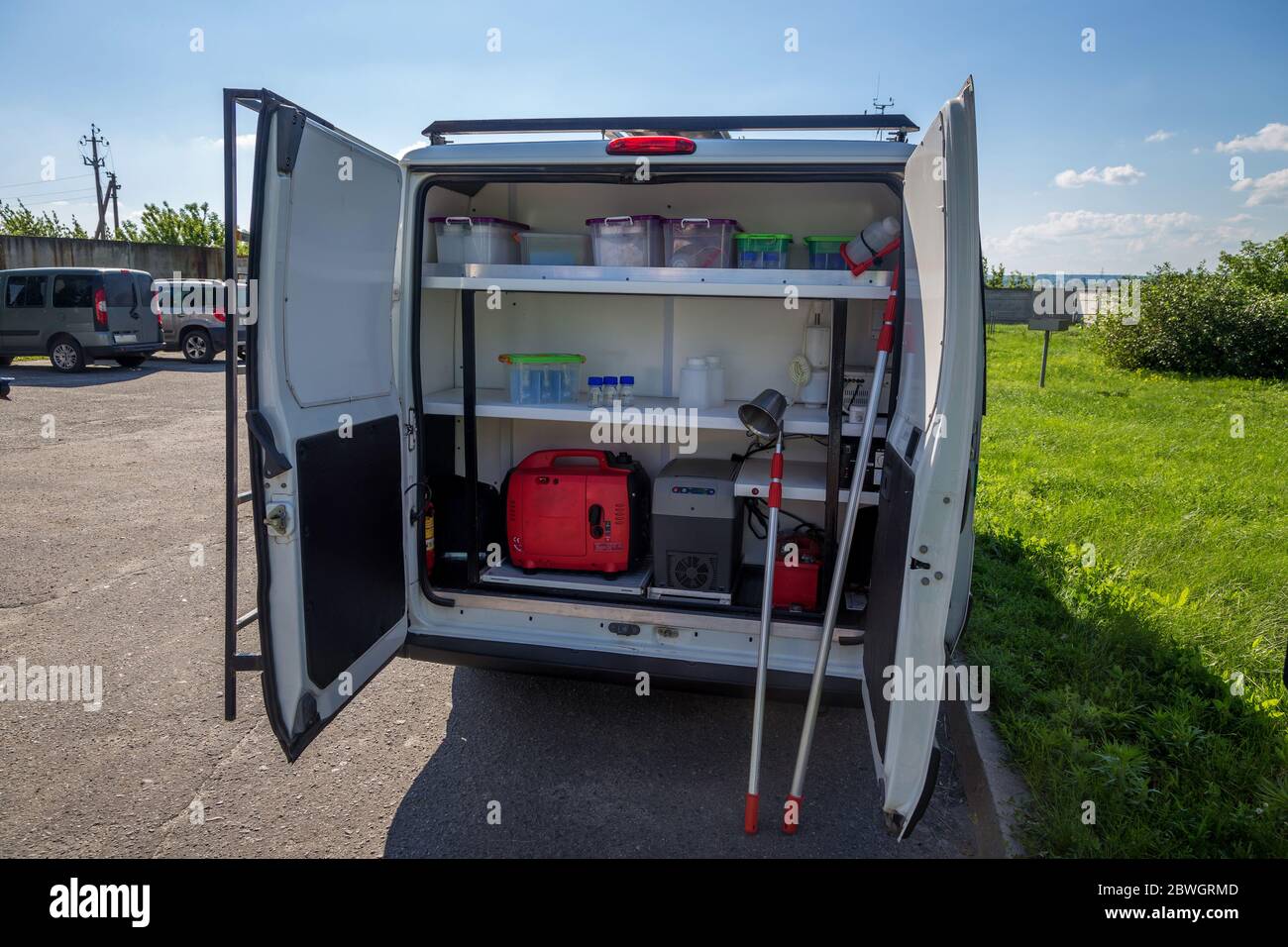 Mobile analytic laboratory in the minivan car, boxes for sampling Stock ...