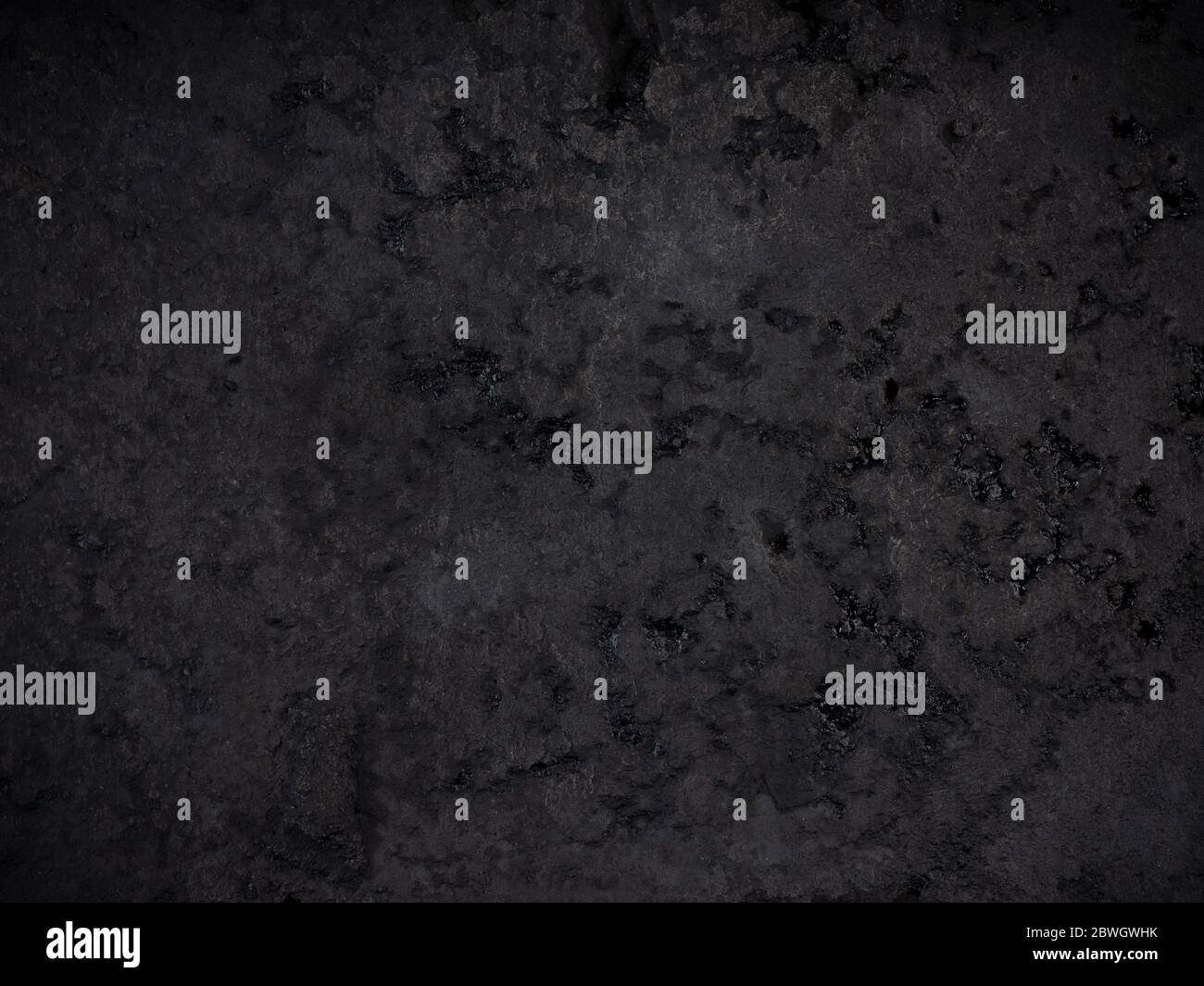 black wall surface, black stucco texture Stock Photo - Alamy