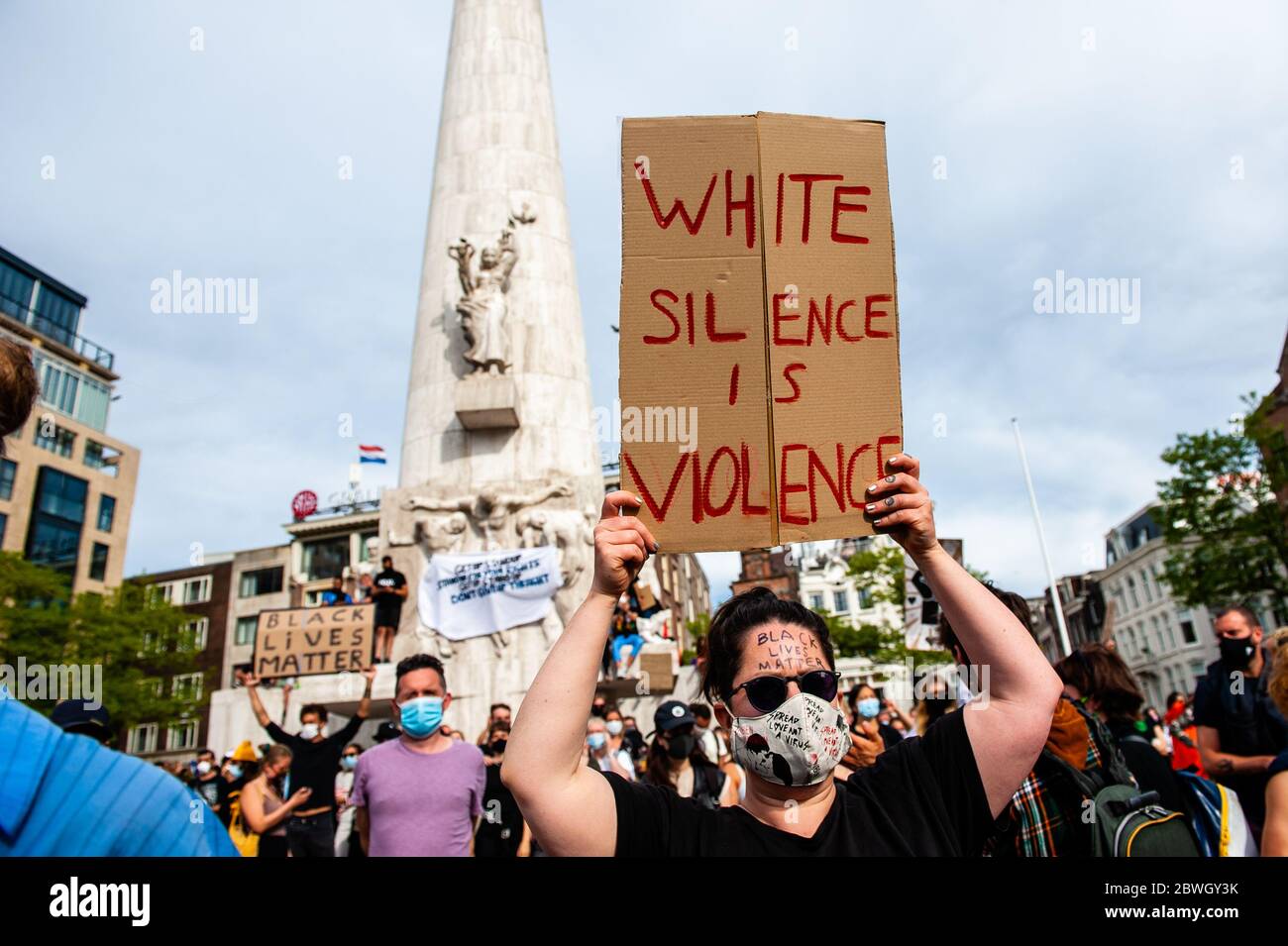 White silence is violence placard hi-res stock photography and images ...