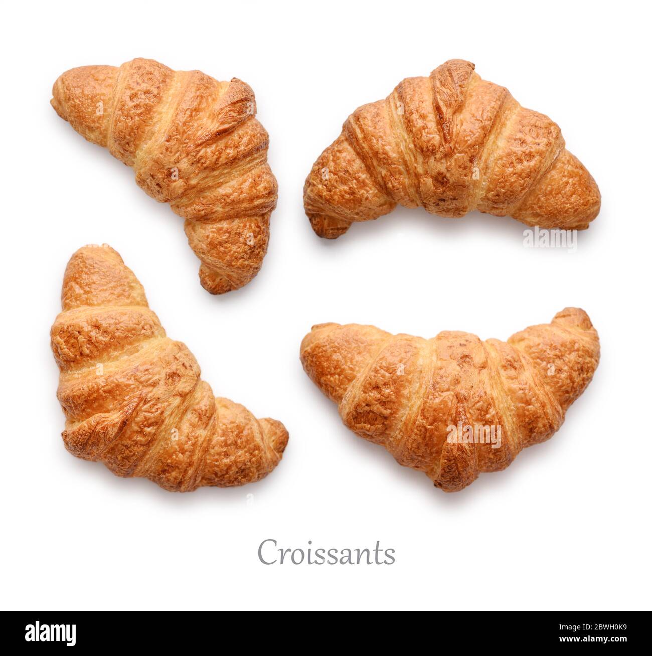 Croissants isolated on white background, top view Stock Photo - Alamy