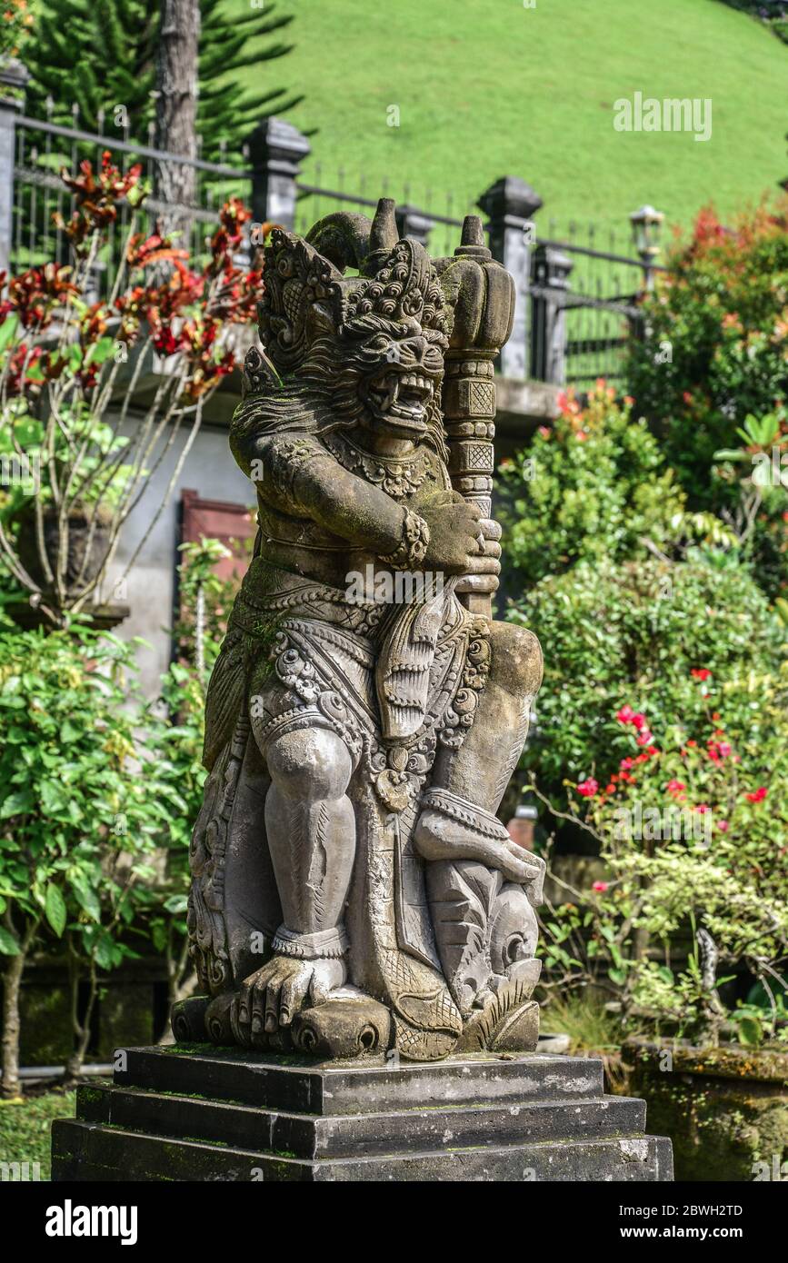 Traditional Balinese guardian statue on territory of Holy Spring Water ...