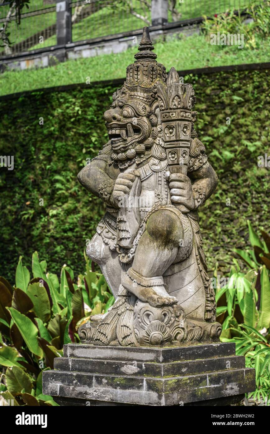 Traditional Balinese guardian statue on territory of Holy Spring Water ...