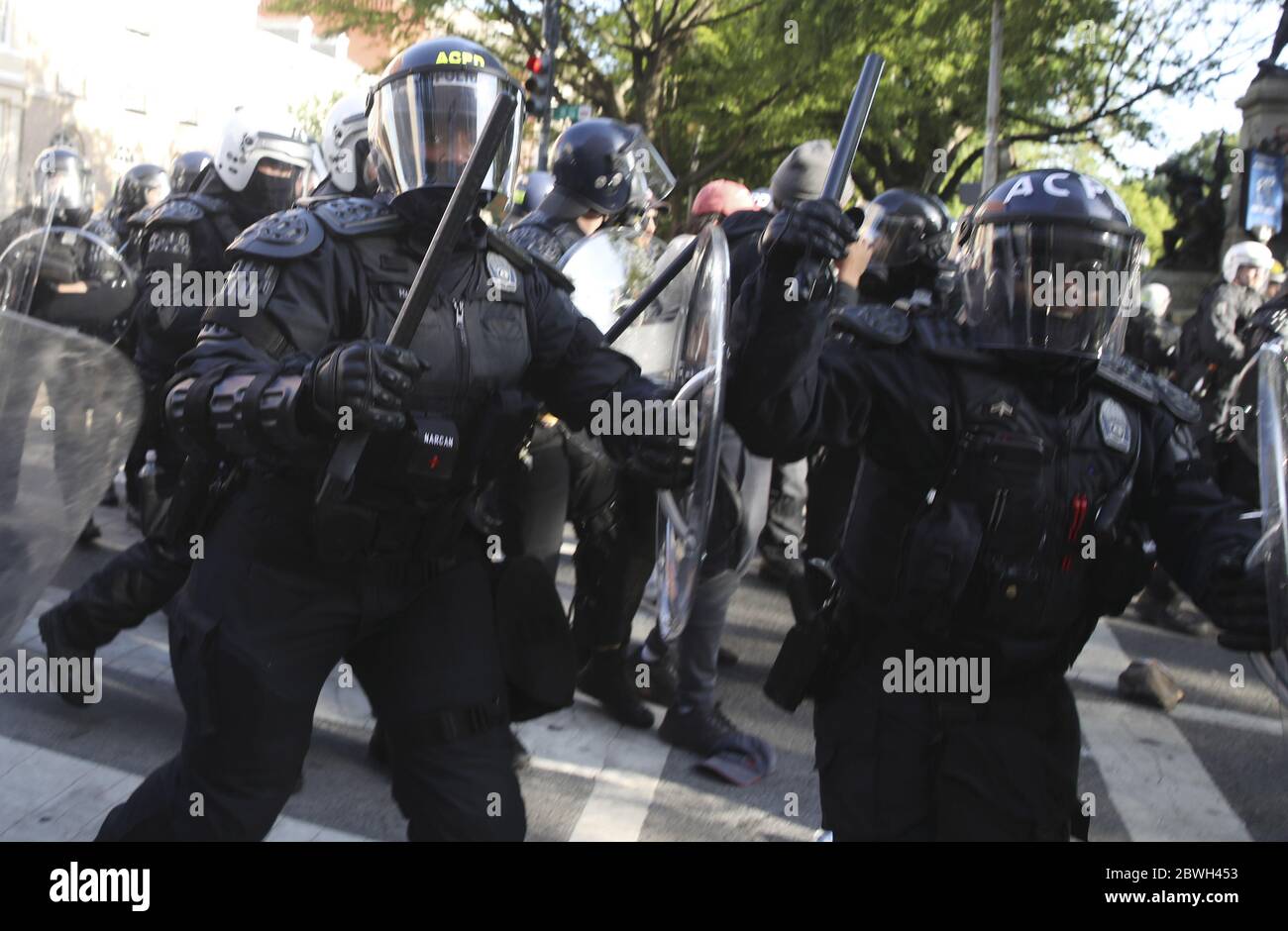 Washington, United States. 01st June, 2020. Police in riot gear charge ...